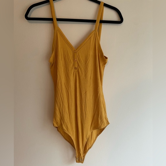 DressUp Boutique | Tops | Mustard Yellow Bodysuit | Poshmark